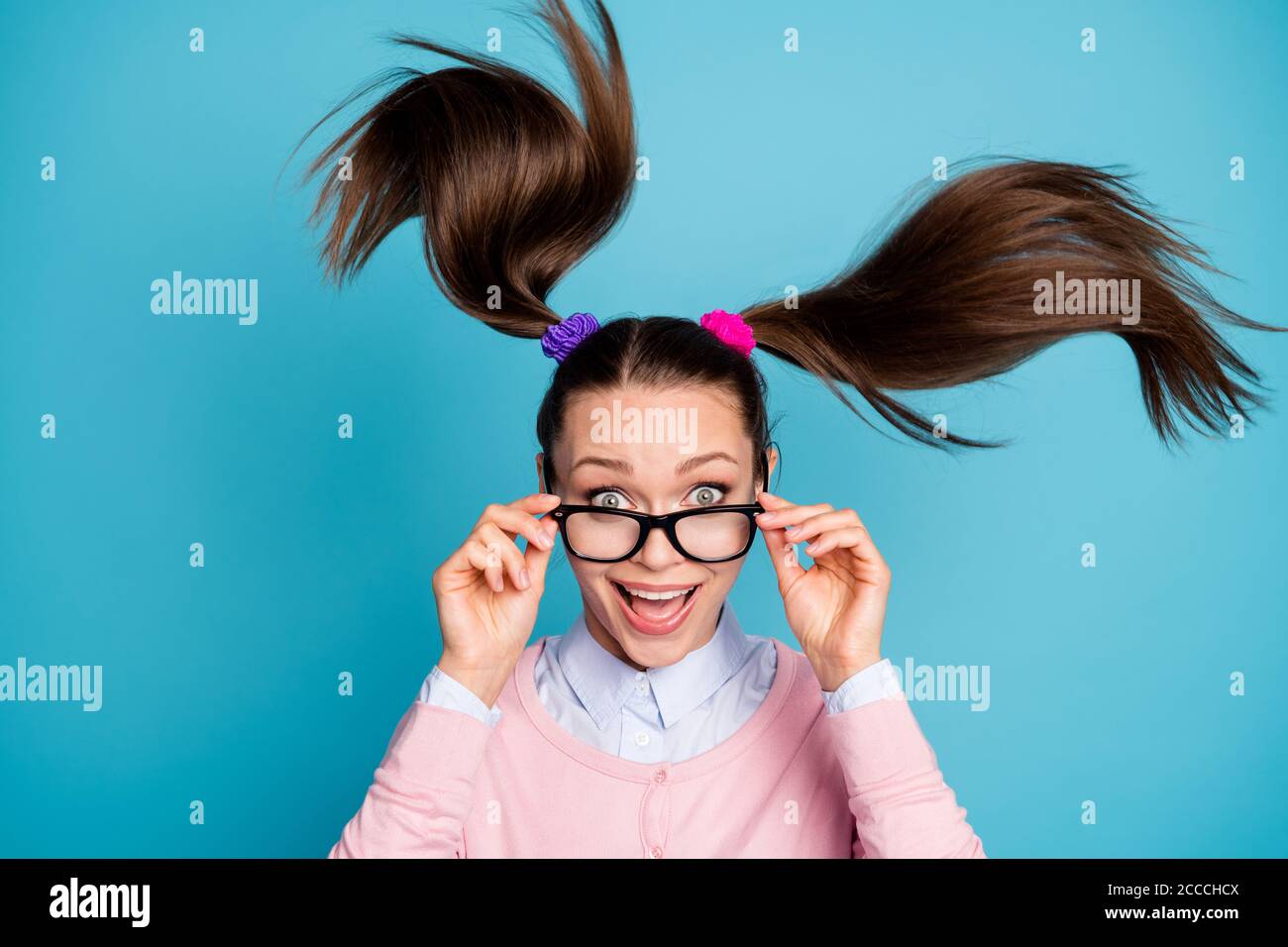 Portrait of crazy funny funky high school girl student touch spectacles ...