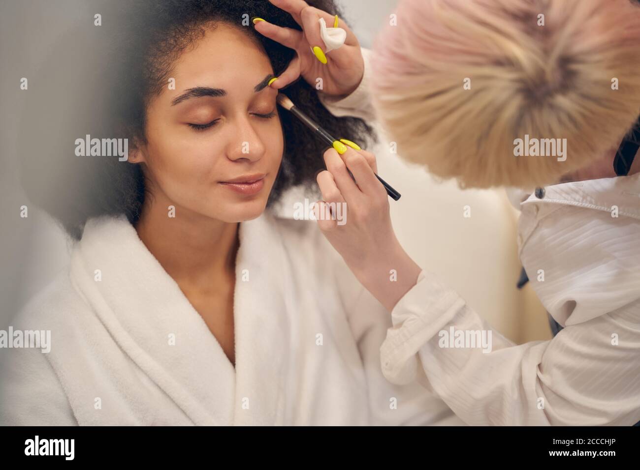 Skilled beauty specialist during working hours in salon Stock Photo - Alamy