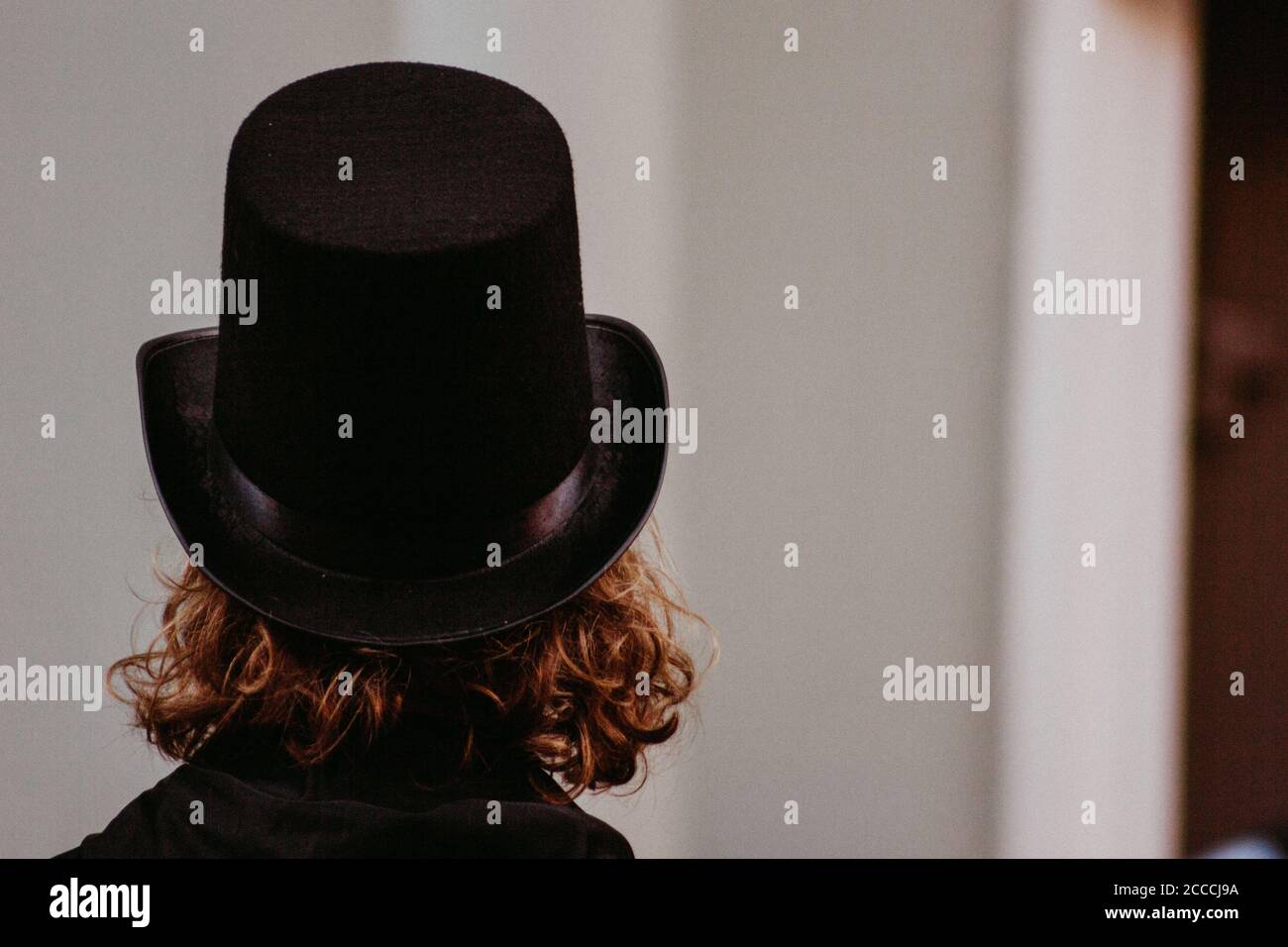mysterious man below with hat on the street young Stock Photo - Alamy