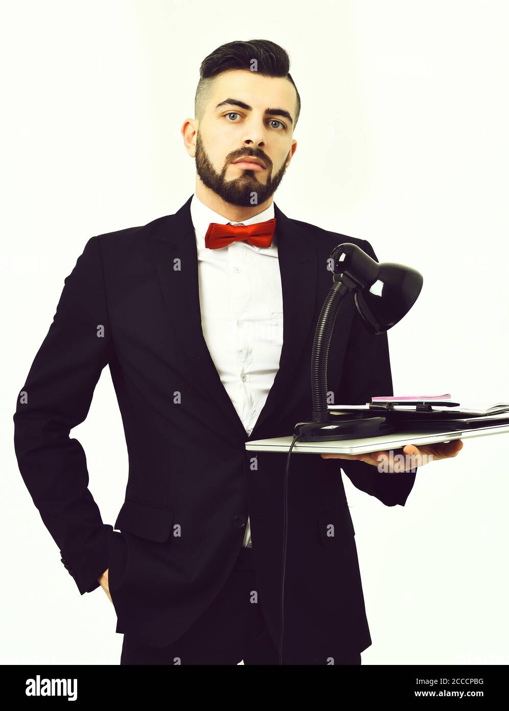 CEO manages office. Serious head manager in black suit and red bow with ...