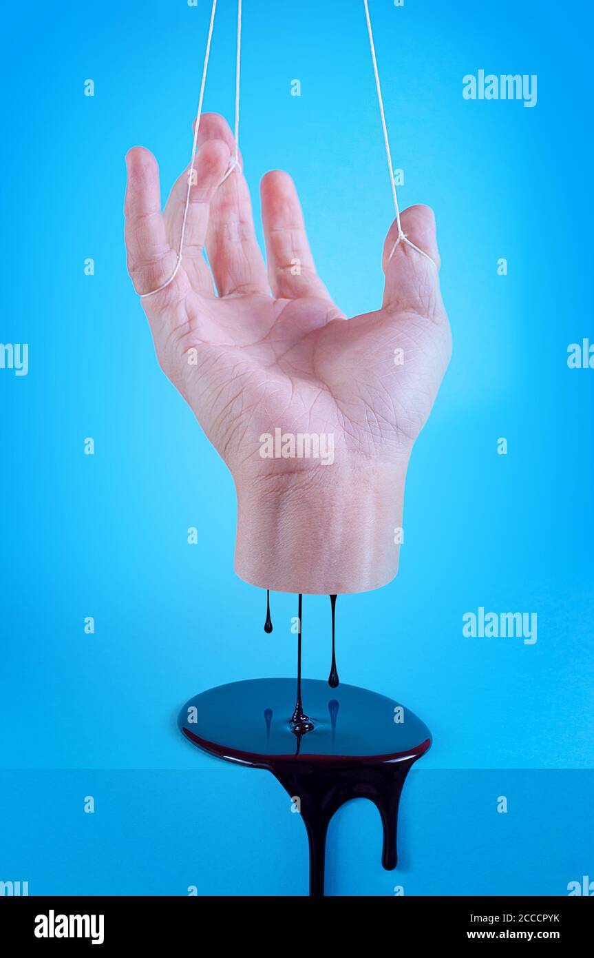 Hand cut blood bleeding hi-res stock photography and images - Alamy