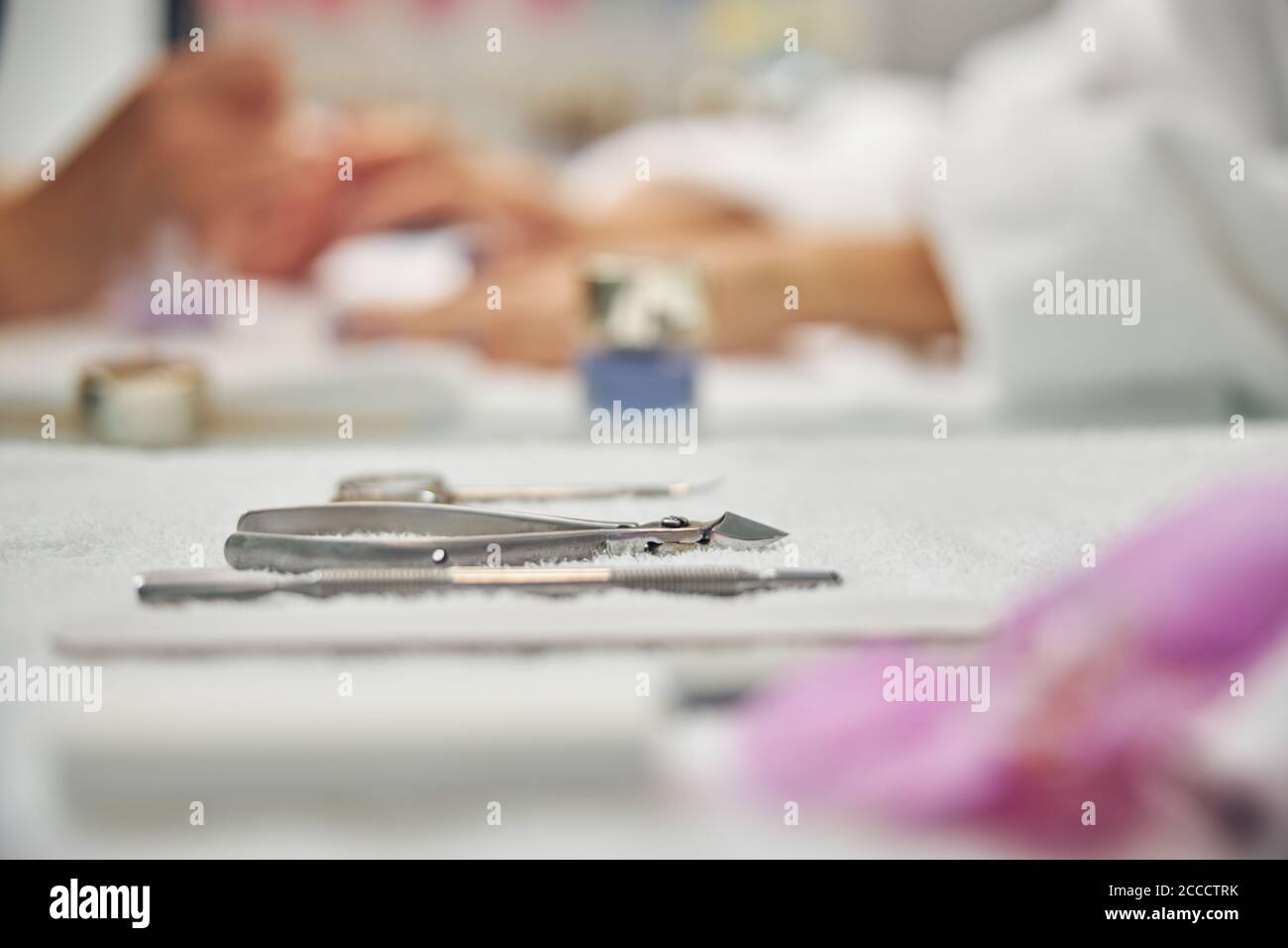 Manicure office with tools during client visit Stock Photo - Alamy