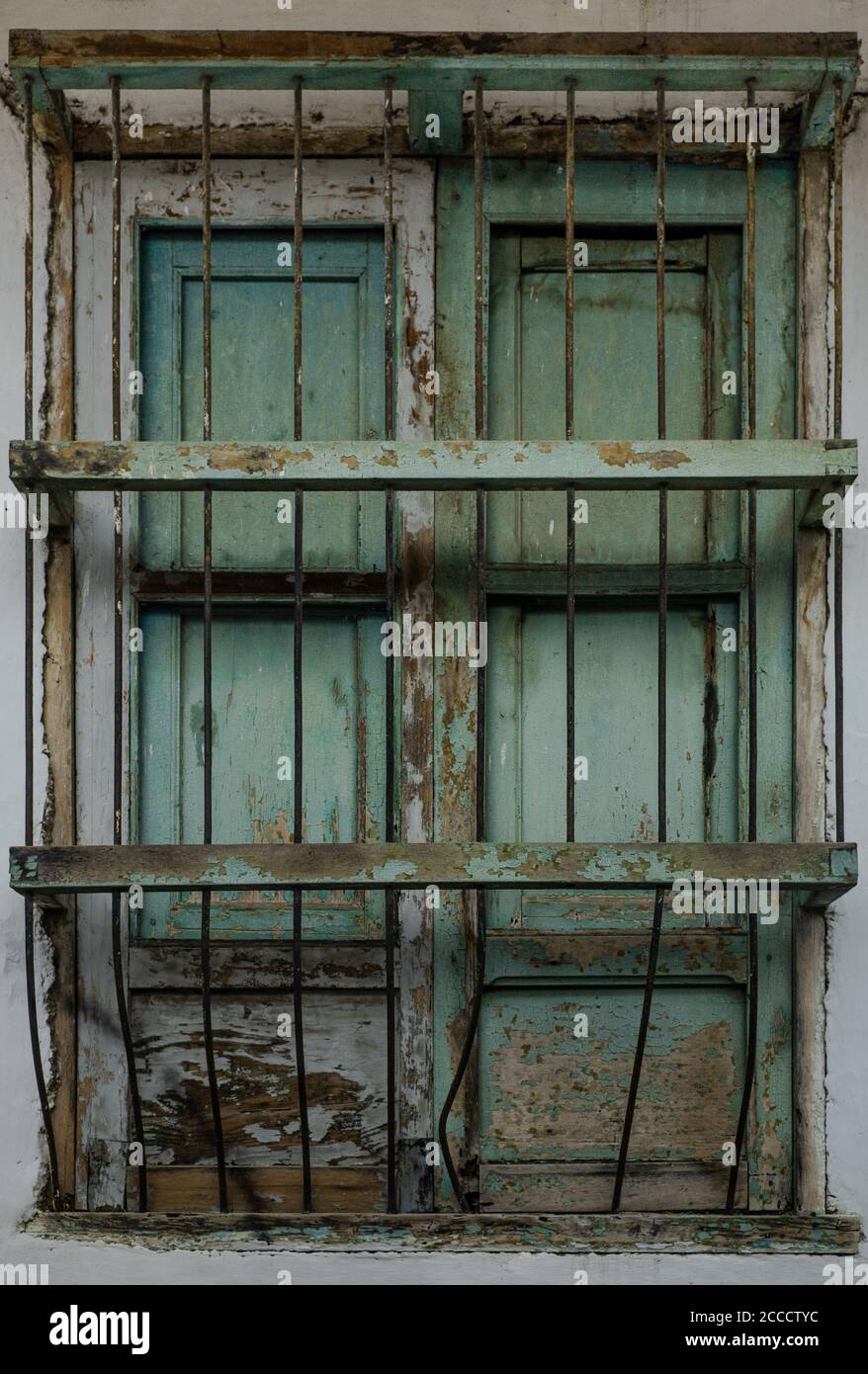 Barred and shuttered Window Stock Photo - Alamy