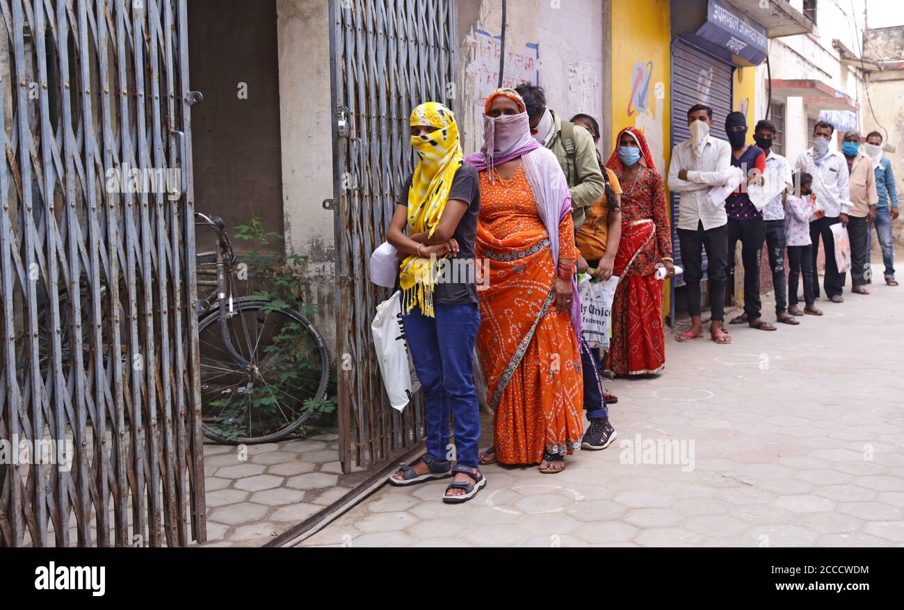 Beawar, Rajasthan, India, Aug 19, 2020: People stands in a queue to get ...