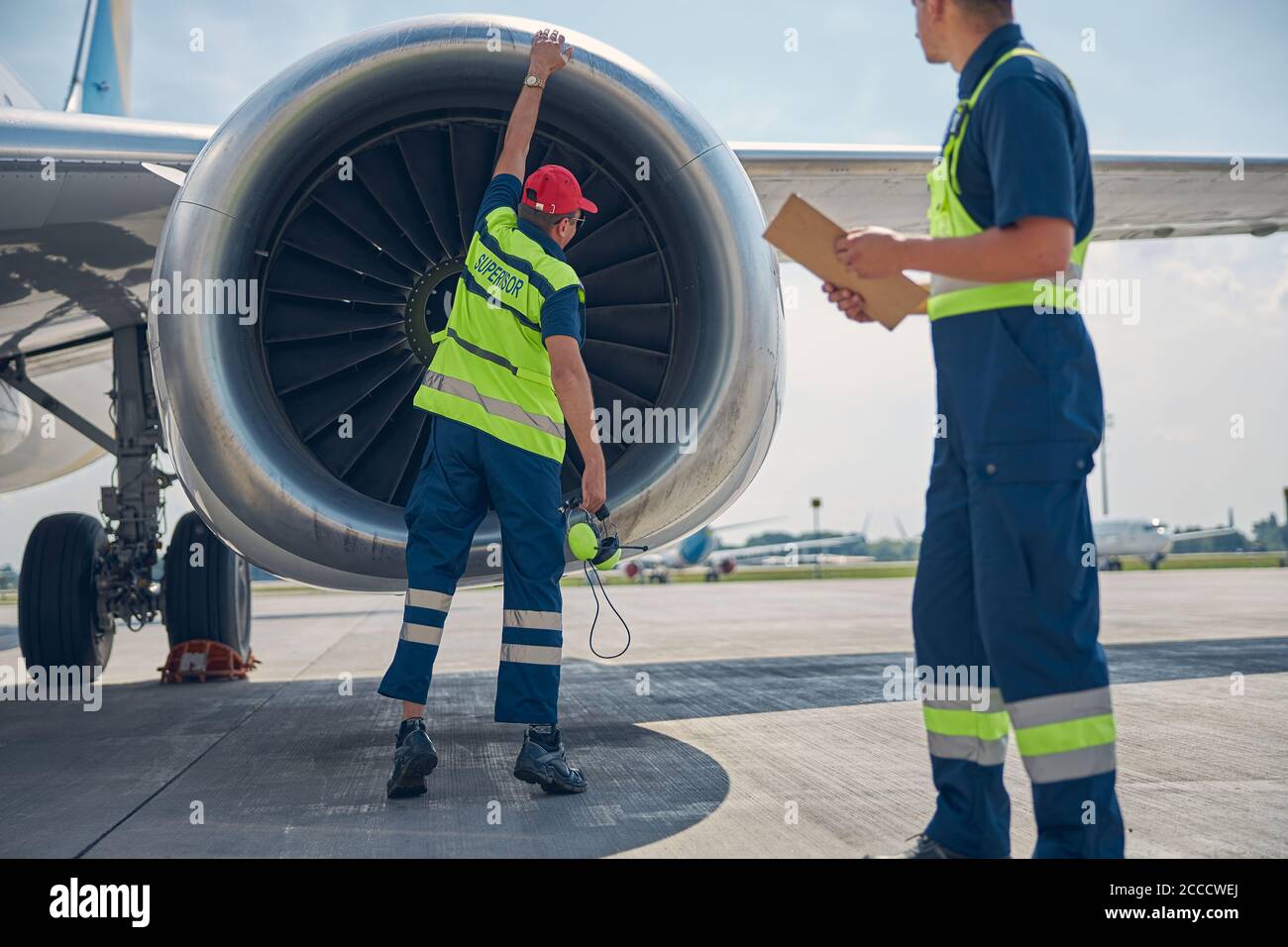 Inspecting an airplane engine hi-res stock photography and images - Alamy