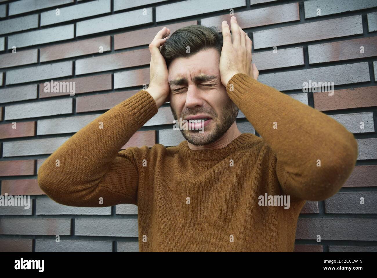 Handsome casual man screaming hand hi-res stock photography and images ...