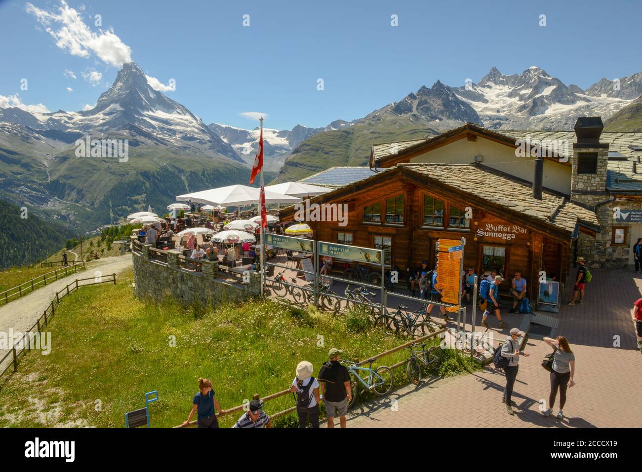 Zermatt, Switzerland - 21 June 2020: people eating on the restaurant of ...