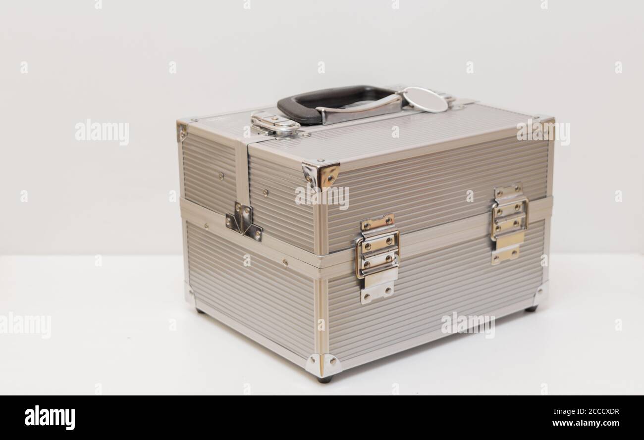 Modern metal box on white background Stock Photo - Alamy