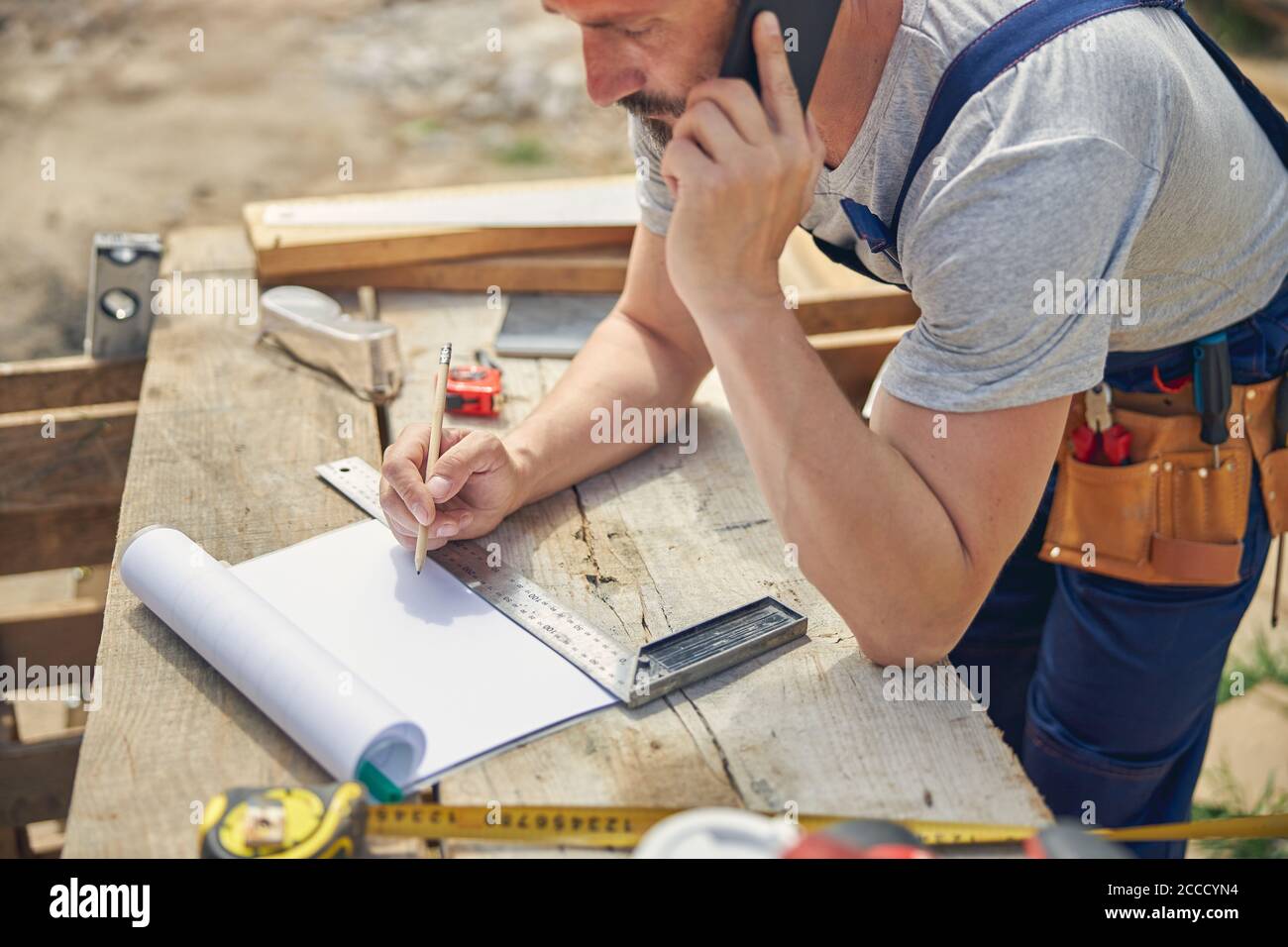Man staring at a blank piece of paper Stock Photo - Alamy