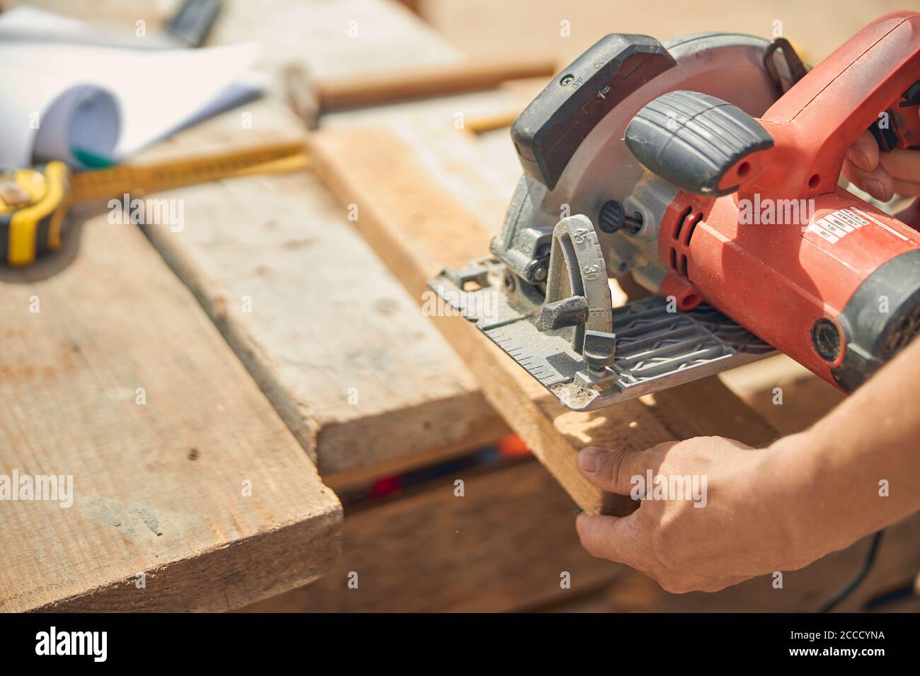 Experienced builder cutting construction hi-res stock photography and ...