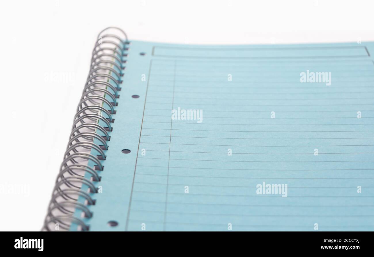 Blank blue pages of notebook with metal rings Stock Photo - Alamy