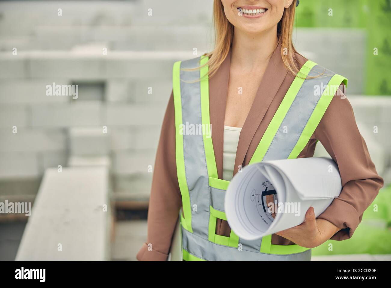 Young civil engineer with her technical drawings Stock Photo - Alamy