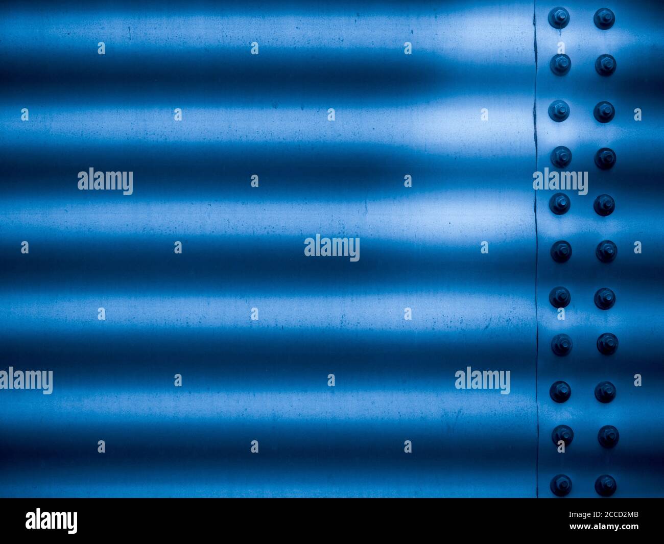 Blue corrugated metal sheet background with screw fasteners Stock Photo ...