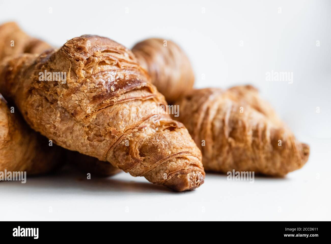 Group of crispy croissants filled with fast absorbing carbohydrates ...