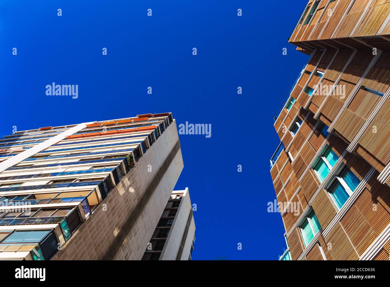 A tall building with a wooden facade to be more ecological and ...