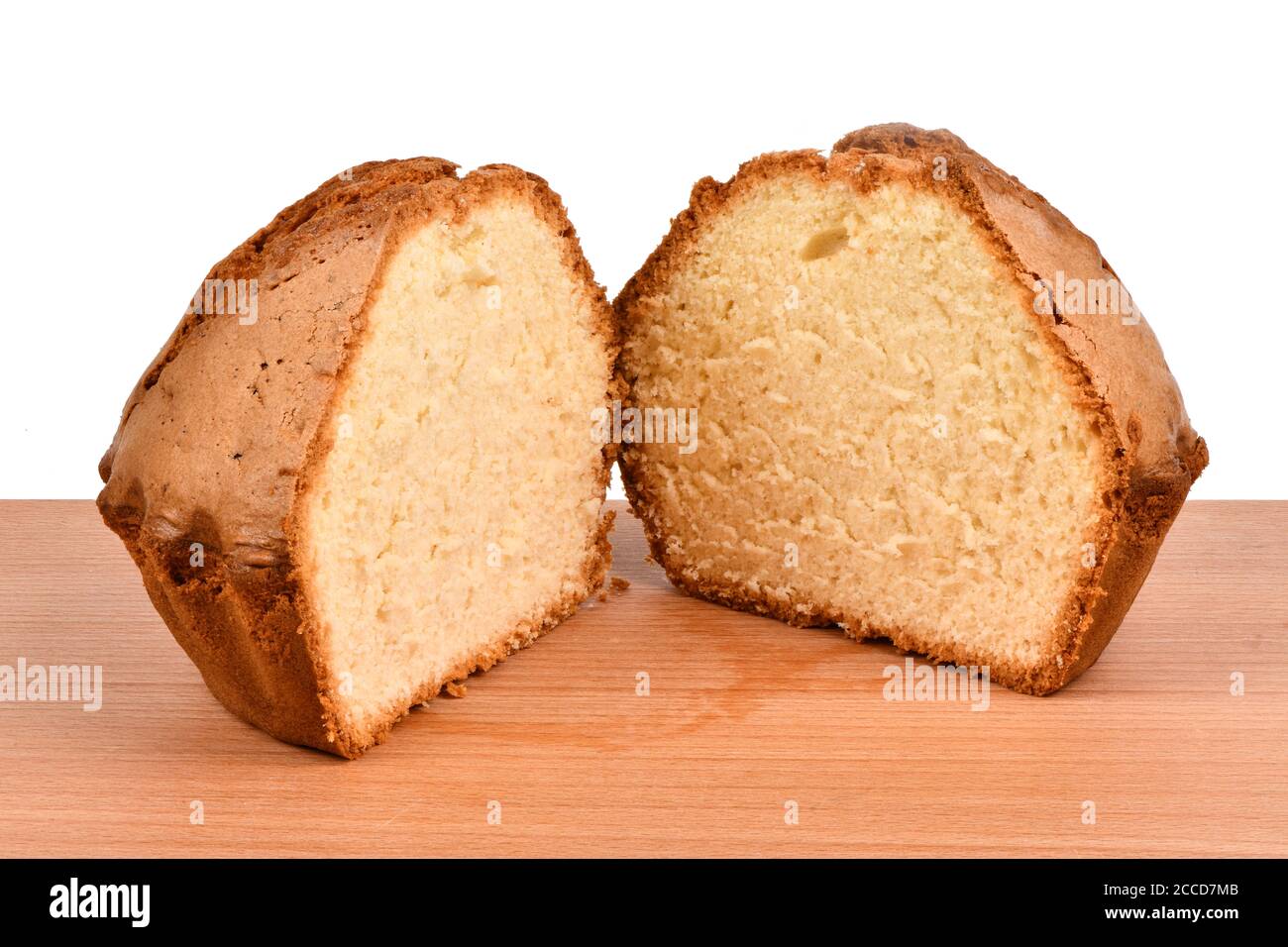 Freshly baked loaves of traditional round whole bread isolated on white ...