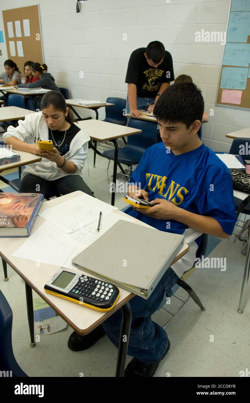 Students using calculator kids hi-res stock photography and images - Alamy