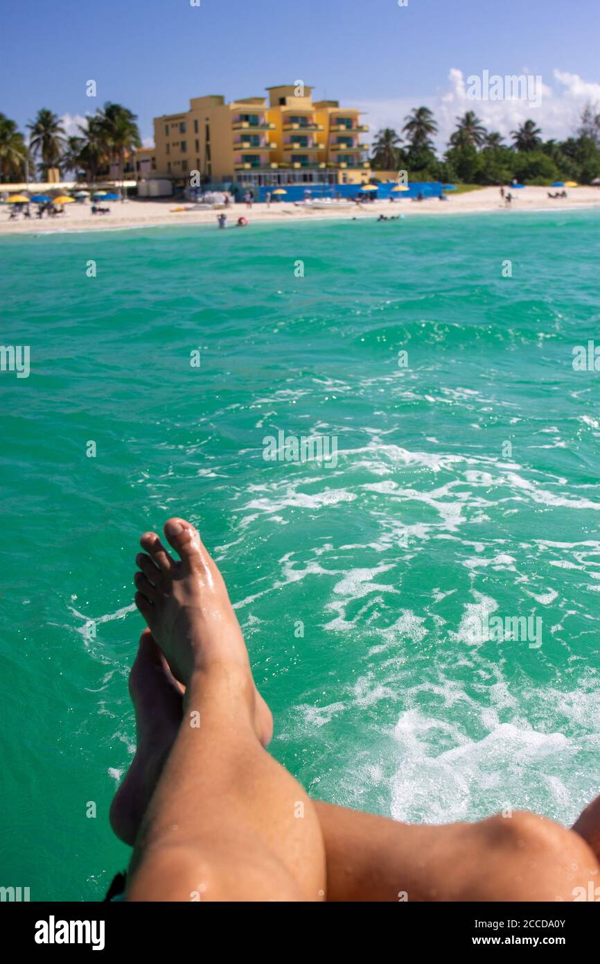Shot of legs of a person on the beach Stock Photo - Alamy