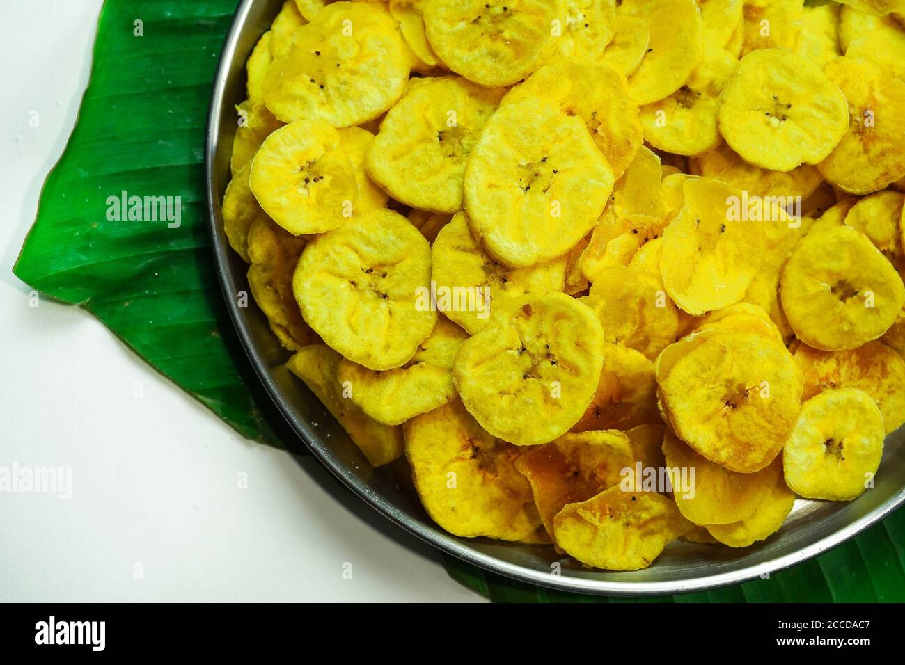 Homemade Plantain / Kerala Banana chips with copy space Stock Photo - Alamy