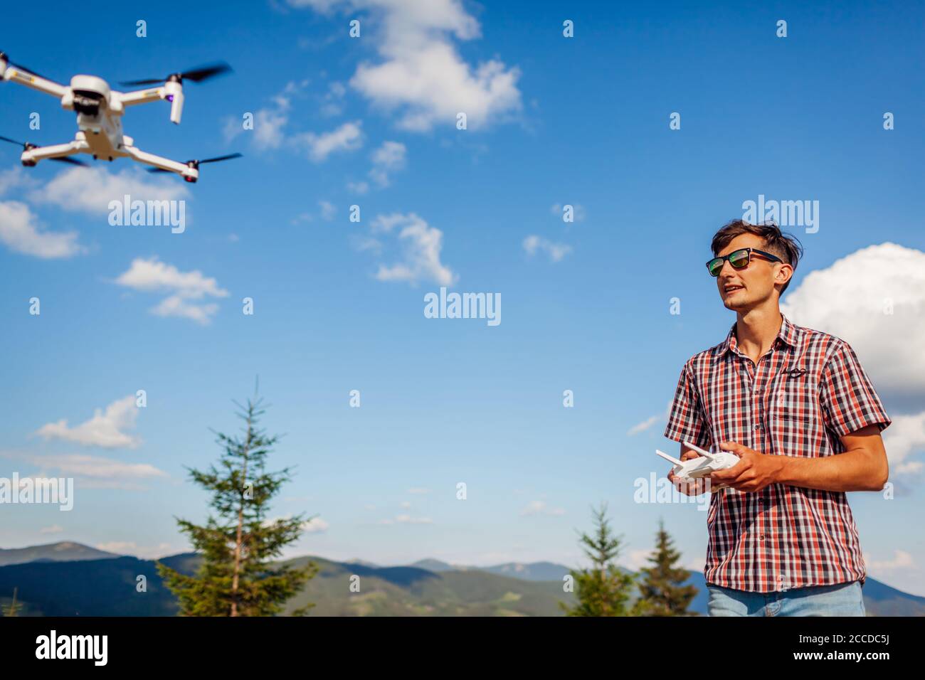 Aerial drone footage shooting of summer Carpathins. Man operating ...
