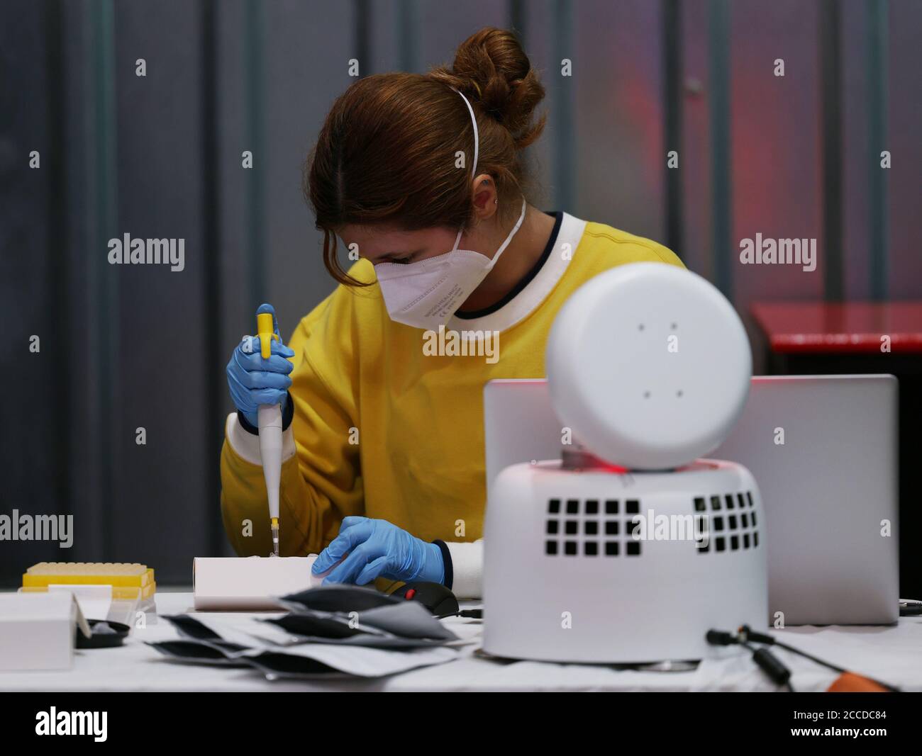 Medical personnel prepare Covid-19 swab test samples - taken from ...