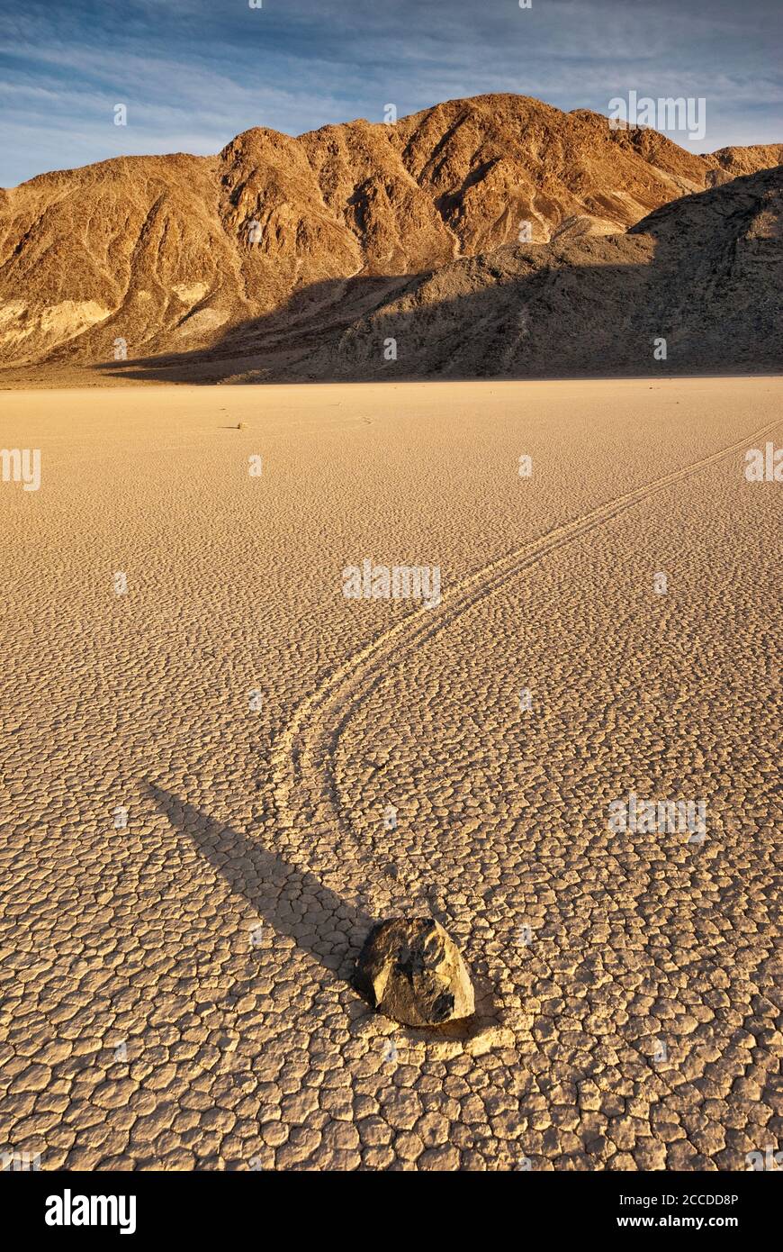 Moving rocks at The Racetrack dry lake, Mojave Desert in Death Valley ...