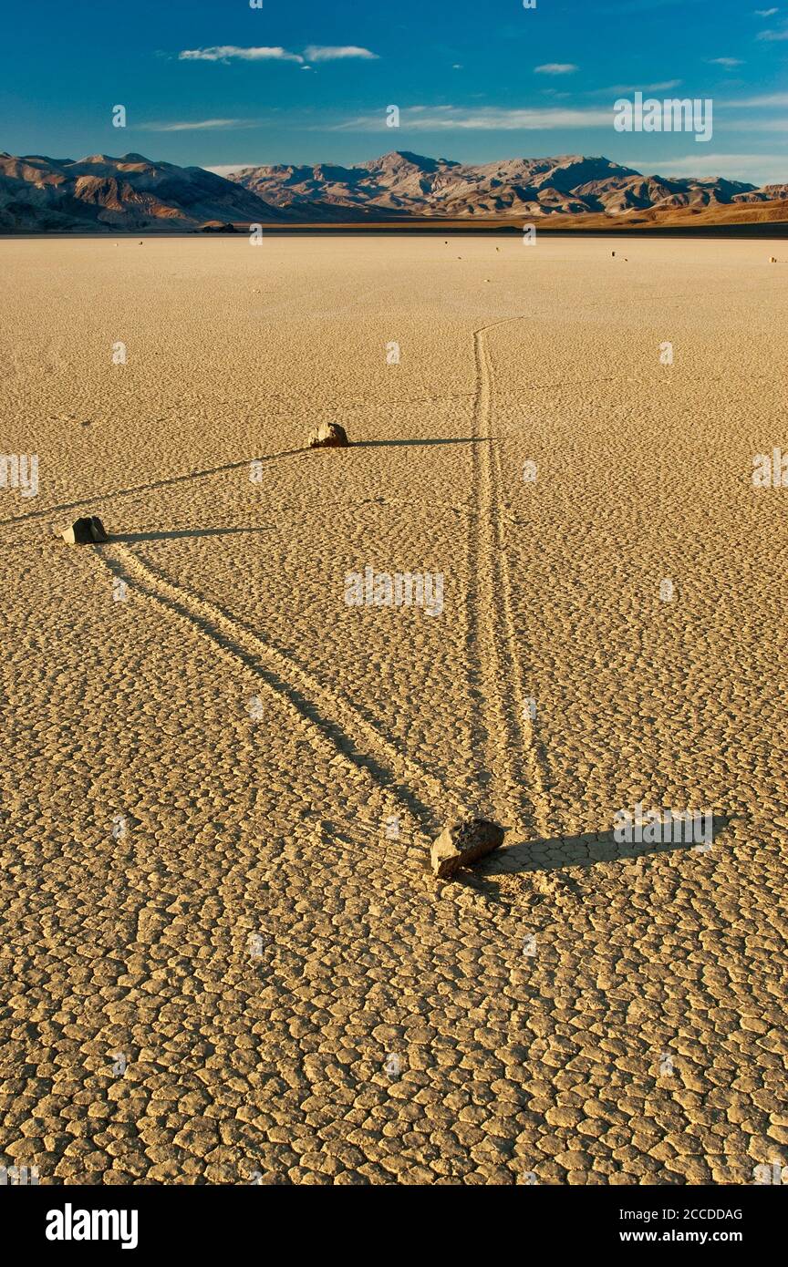 Moving rocks at The Racetrack dry lake, Mojave Desert in Death Valley ...