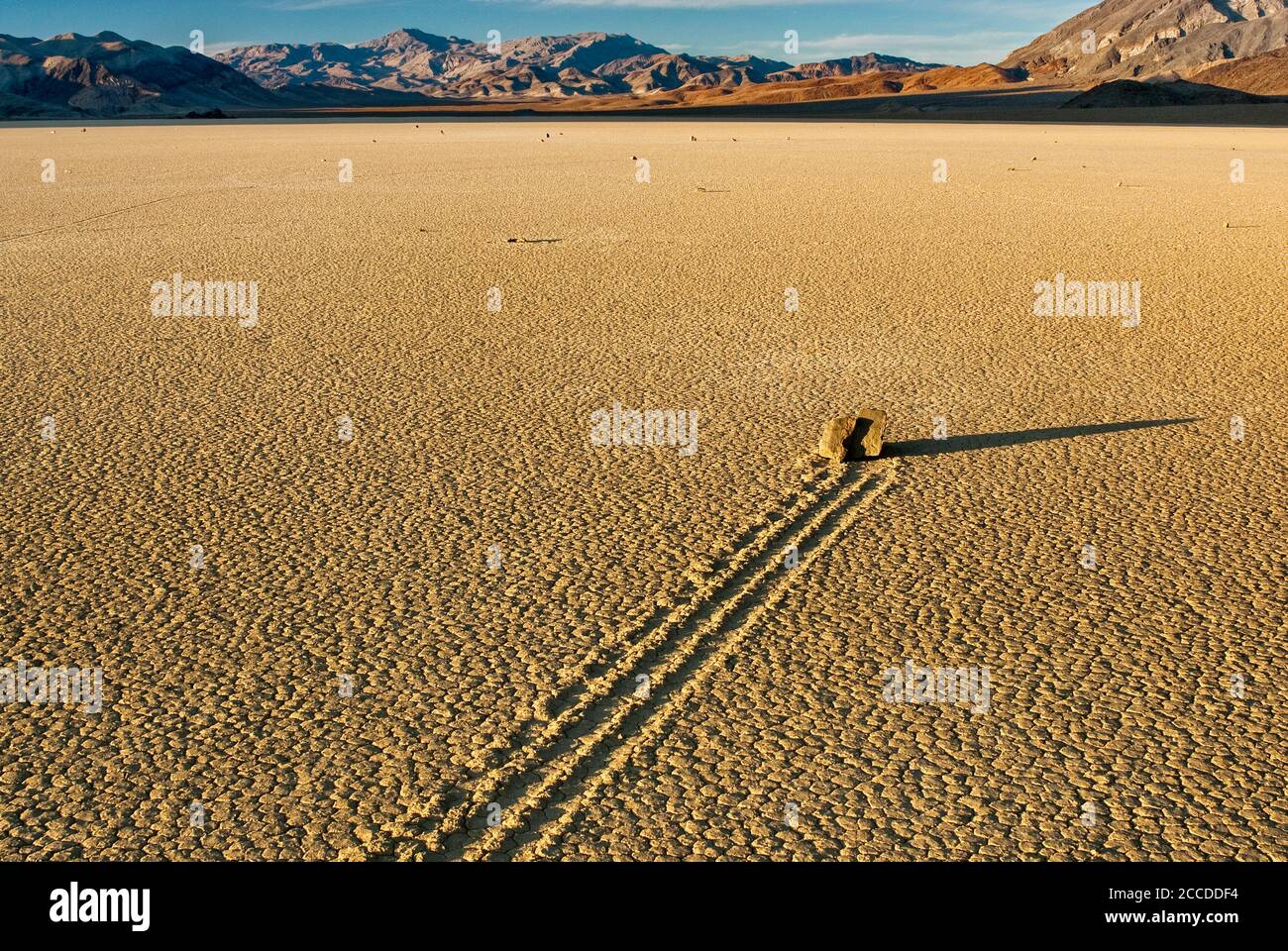 Moving rocks at The Racetrack dry lake, Mojave Desert in Death Valley ...
