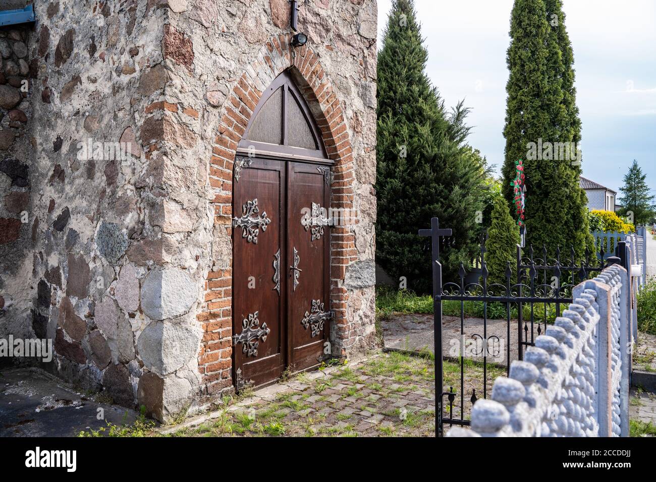 Small stone house wooden gate hi-res stock photography and images - Alamy