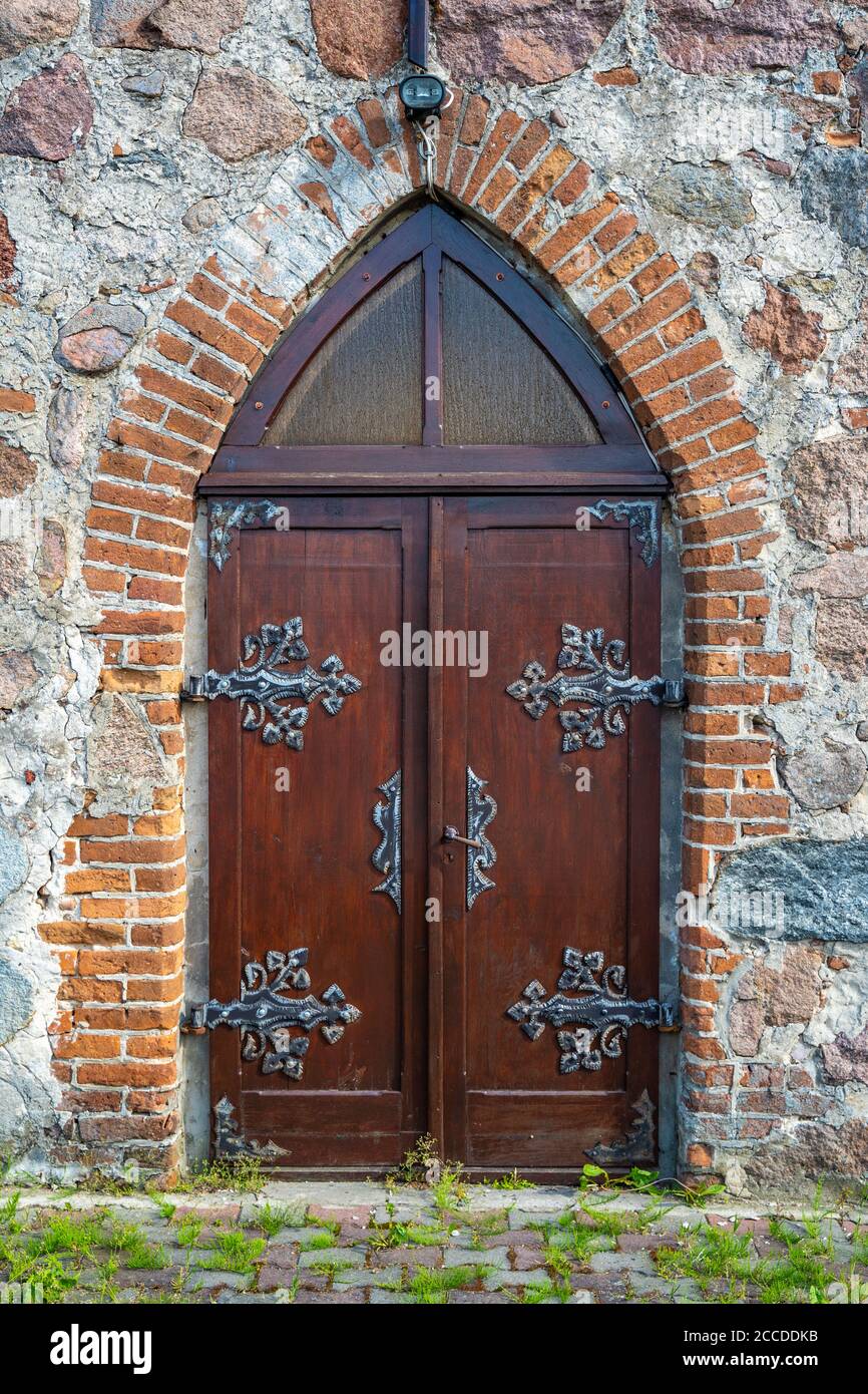 Small stone house wooden gate hi-res stock photography and images - Alamy
