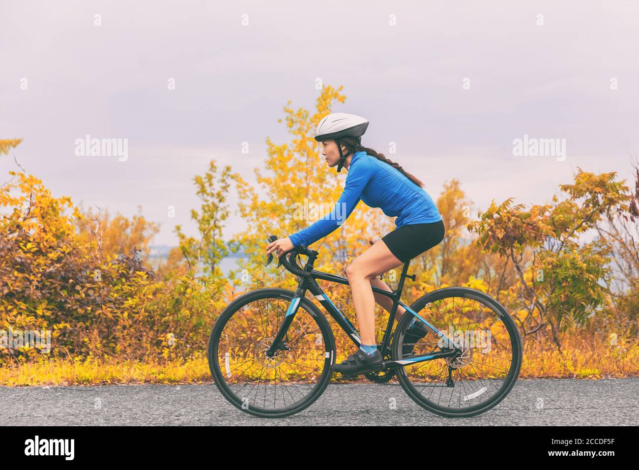 Woman road cyclist hi-res stock photography and images - Alamy