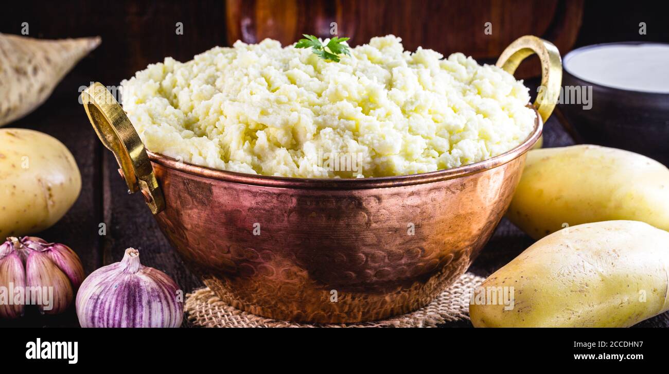 cream or mashed potato, served in a metallic copper pot, organic and ...