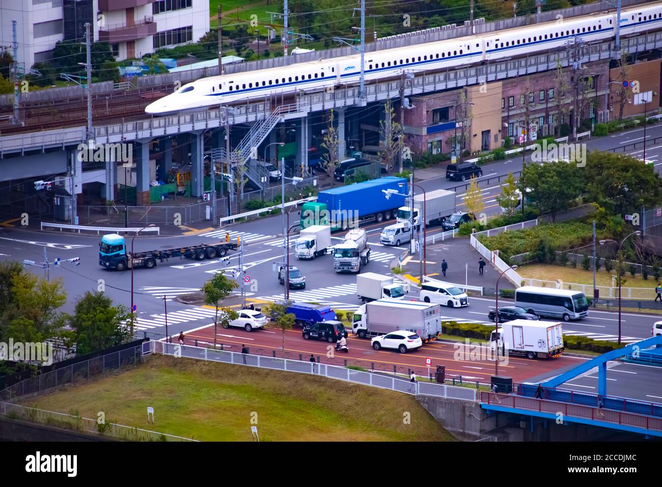 A city street near the river in Shinagawa Tokyo high angle long shot ...