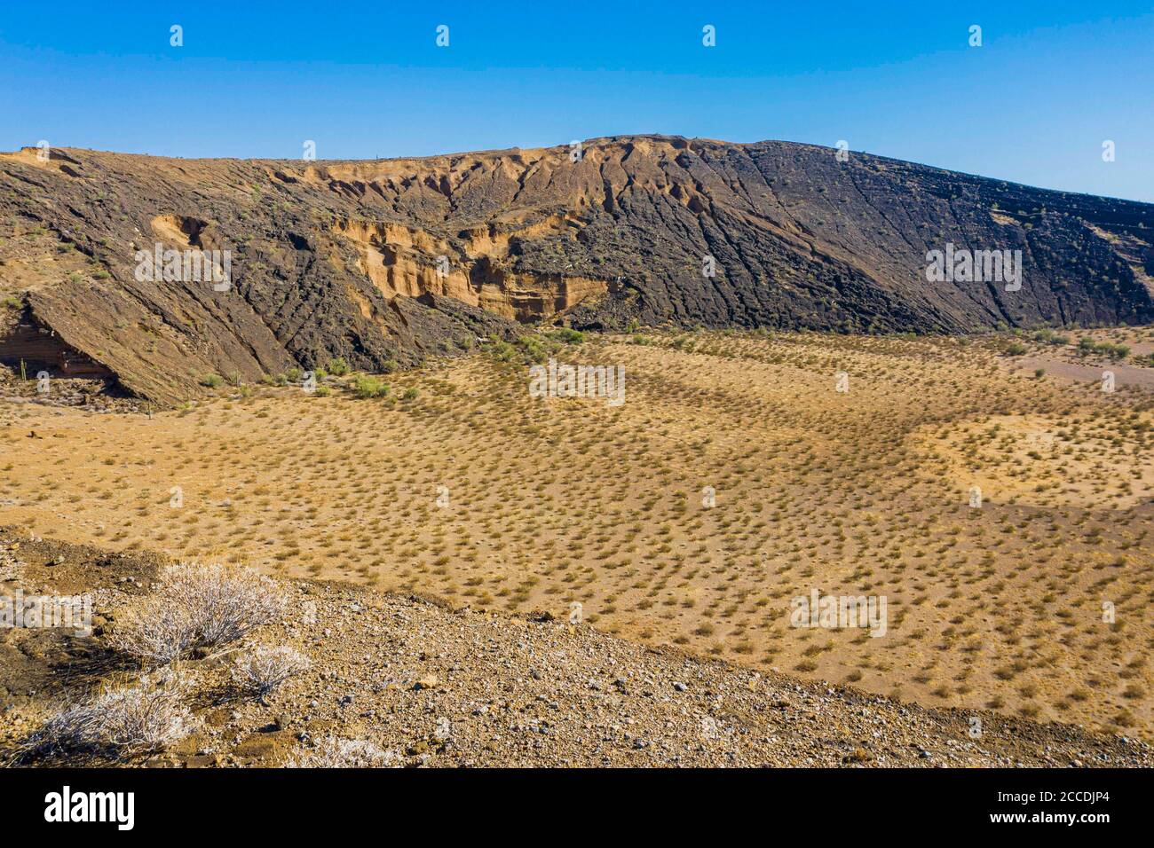 Aerial view of the maar-type volcanic crater, cater Cerro Colorado in ...