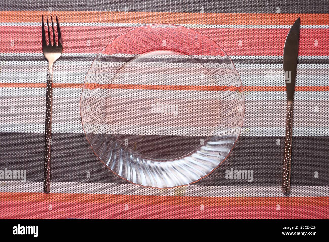 Hungry woman empty plate hi-res stock photography and images - Alamy