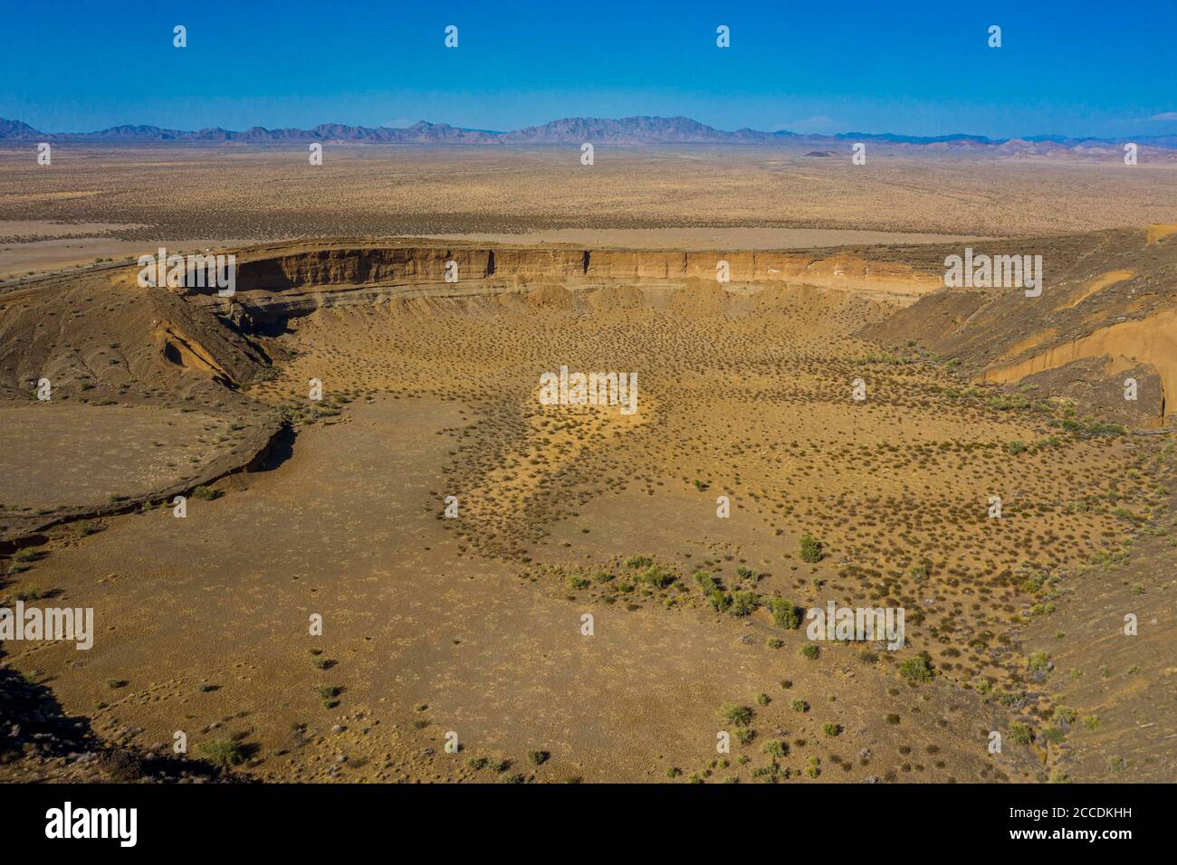 Aerial view of the maar-type volcanic crater, cater Cerro Colorado in ...