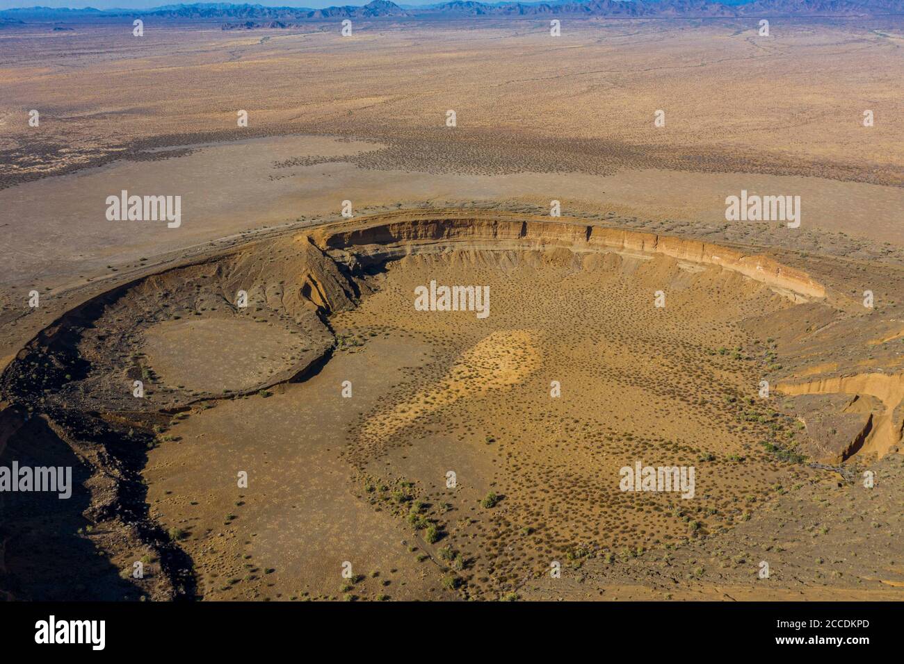 Aerial view of the maar-type volcanic crater, cater Cerro Colorado in ...