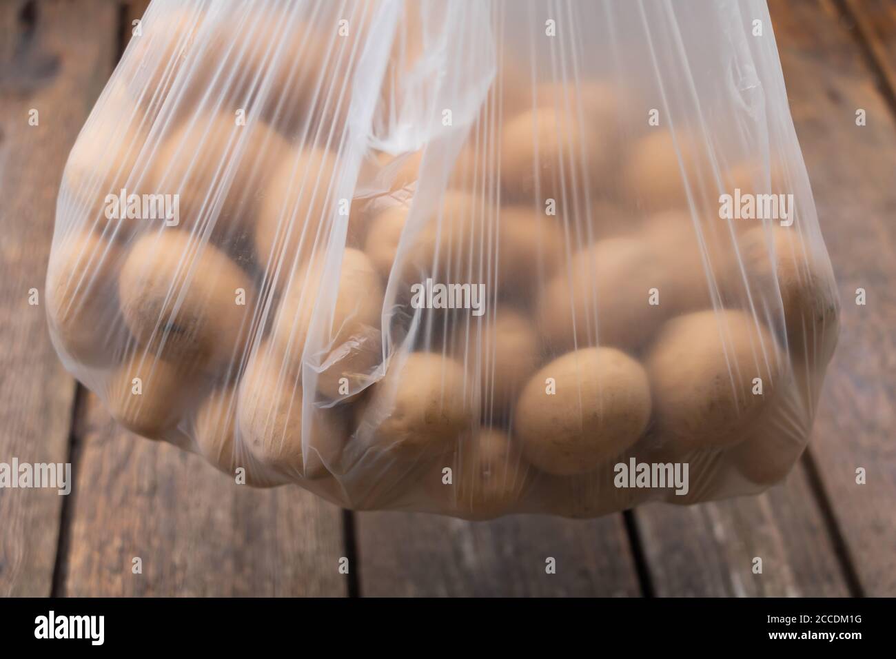 A bag of potatoes. Potatoes health benefits concept Stock Photo - Alamy