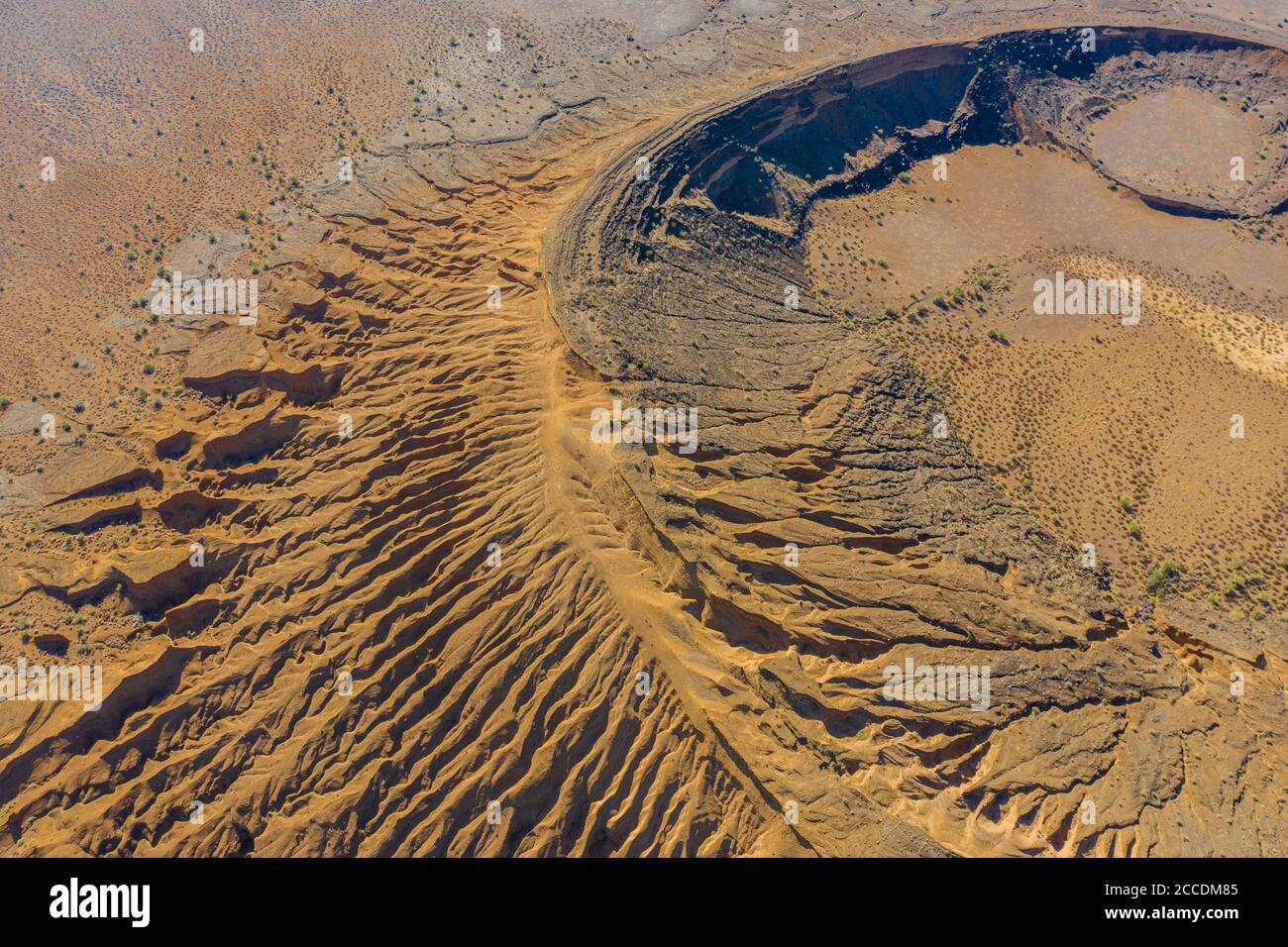 Aerial view of the maar-type volcanic crater, cater Cerro Colorado in ...