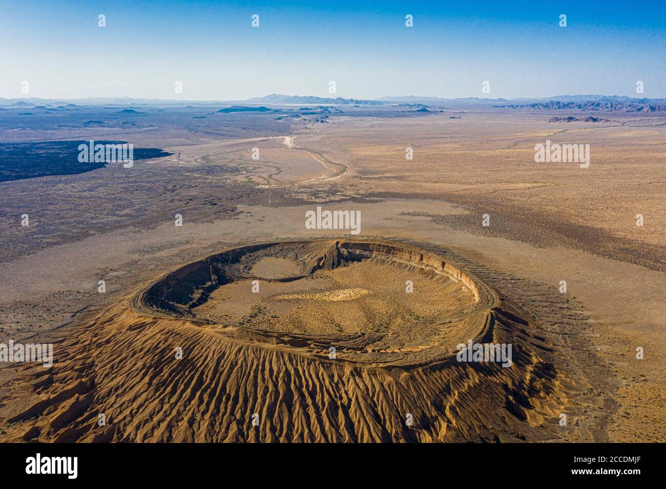 Aerial view of the maar-type volcanic crater, cater Cerro Colorado in ...