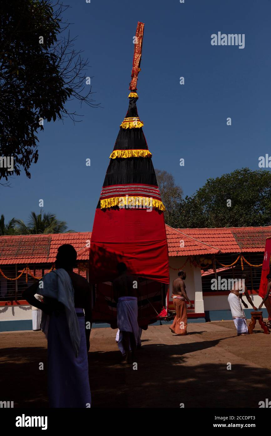 A Theyyam artist performs traditional rituals at a Kerala temple Stock ...