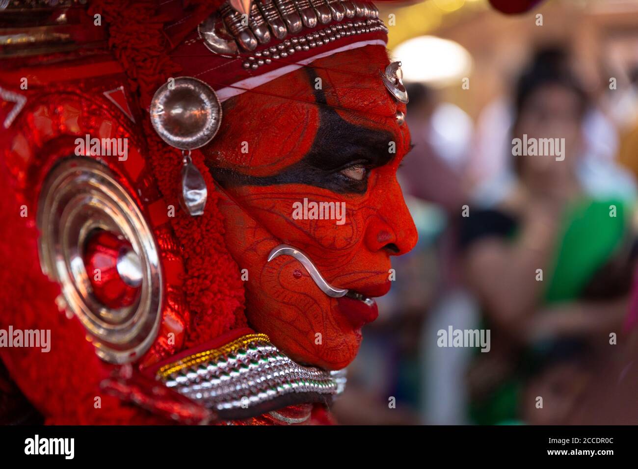 A Theyyam artist performs traditional rituals at a Kerala temple Stock ...
