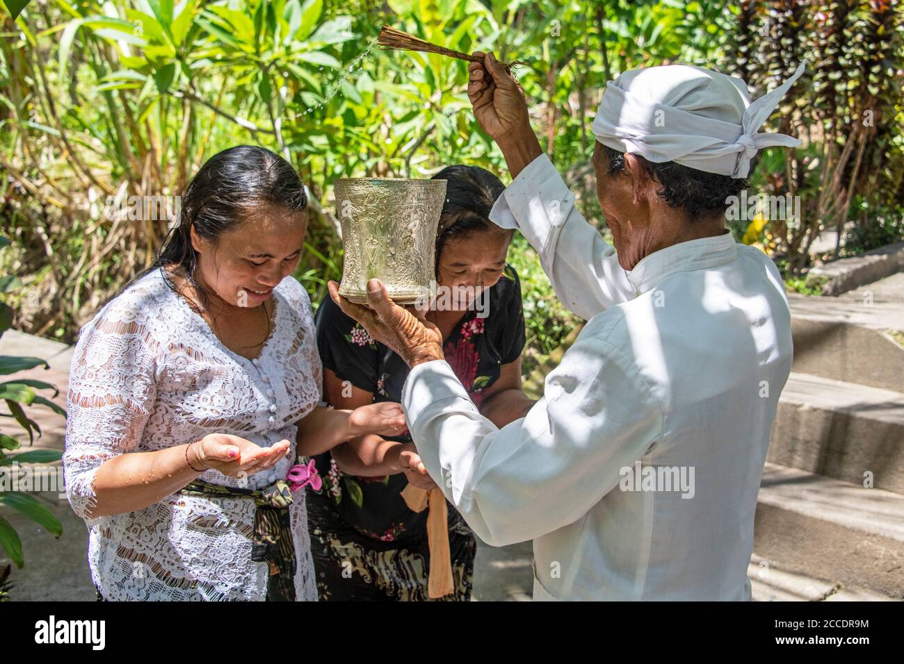 The Melukat ceremony is a purification ceremony to cleanse the body ...