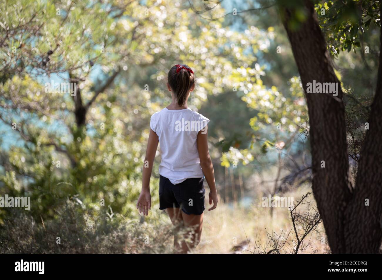 Girl walking from behind hi-res stock photography and images - Alamy