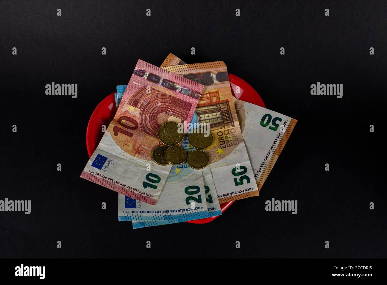 Paper currency notes and coins flying hi-res stock photography and ...