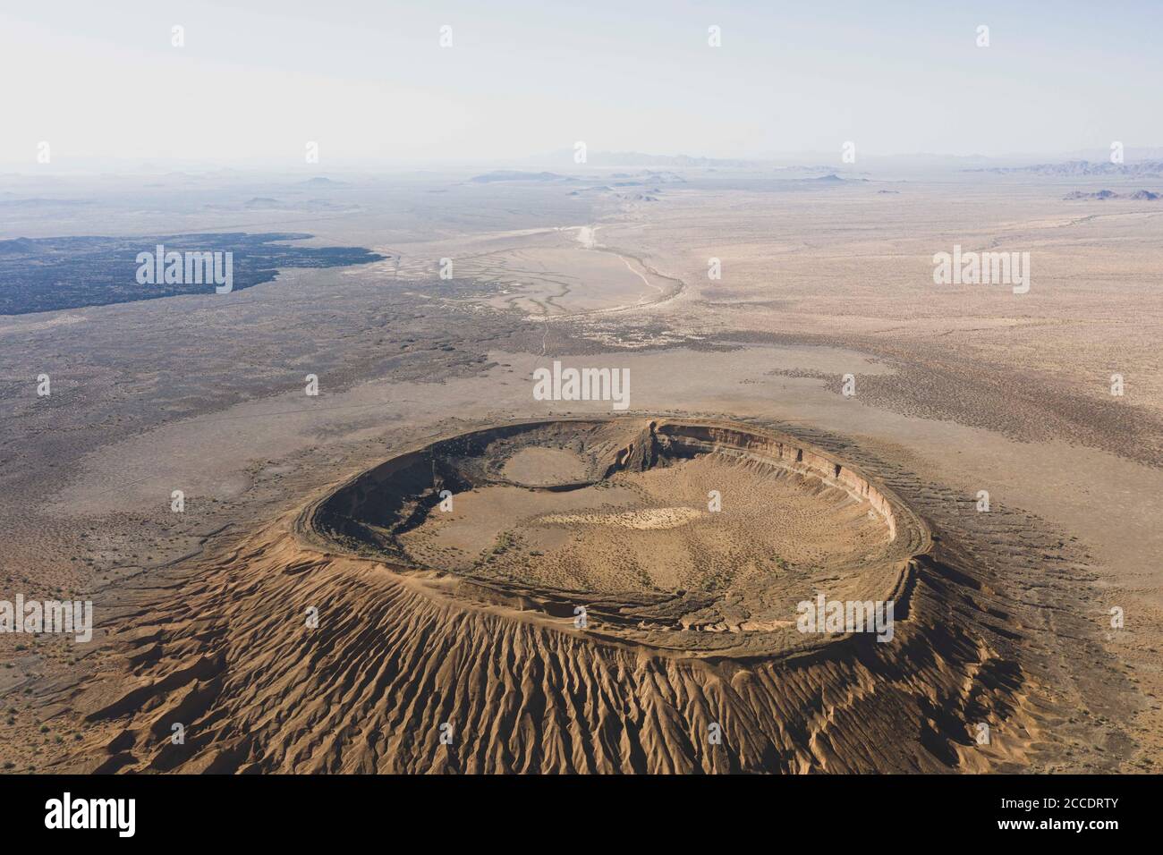 Aerial view of the maar-type volcanic crater, cater Cerro Colorado in ...