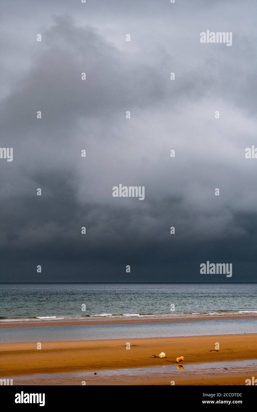 Rain clouds over beach hi-res stock photography and images - Alamy