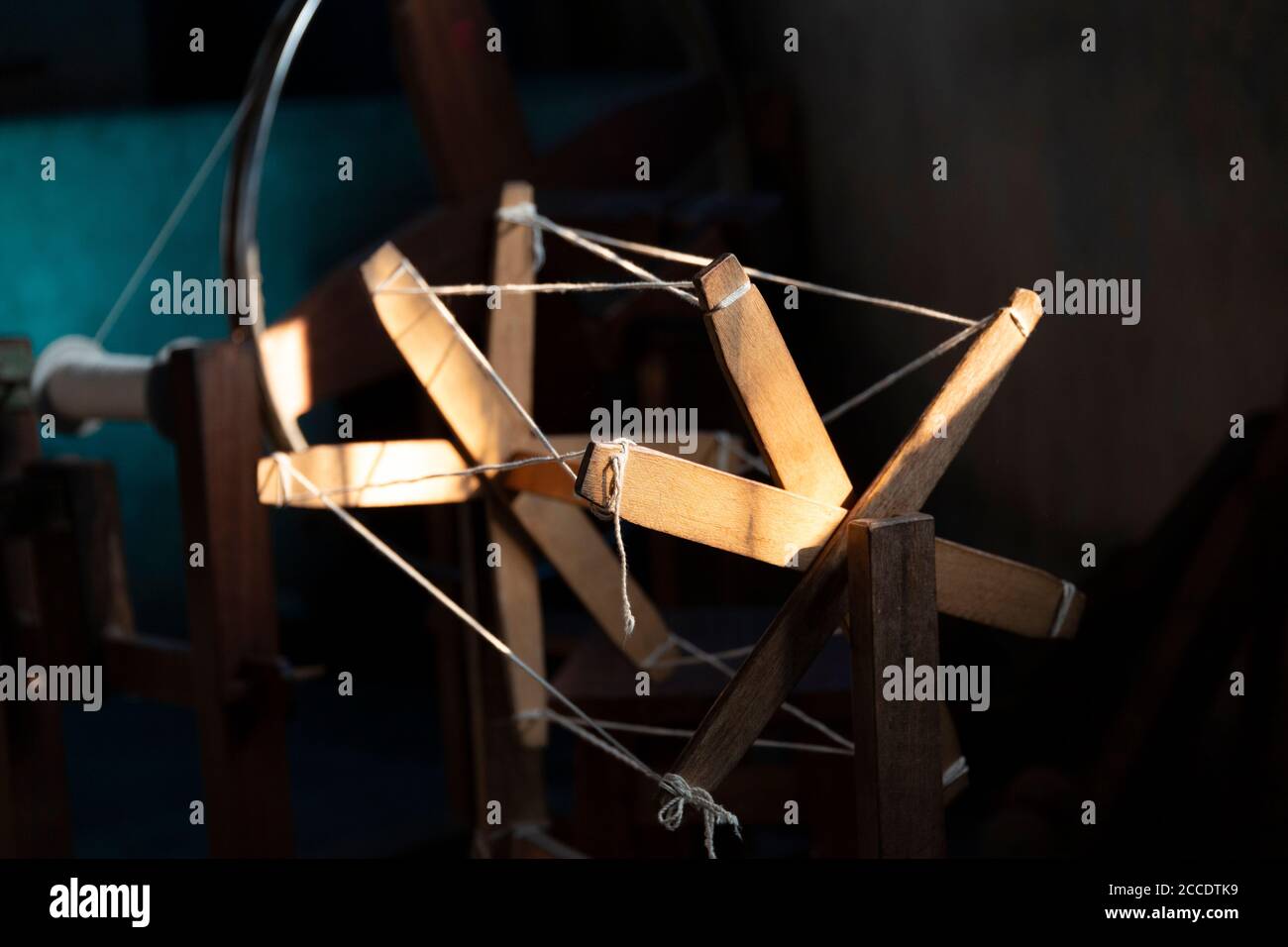 Old wooden spinning wheel for knitting stock photo Stock Photo - Alamy