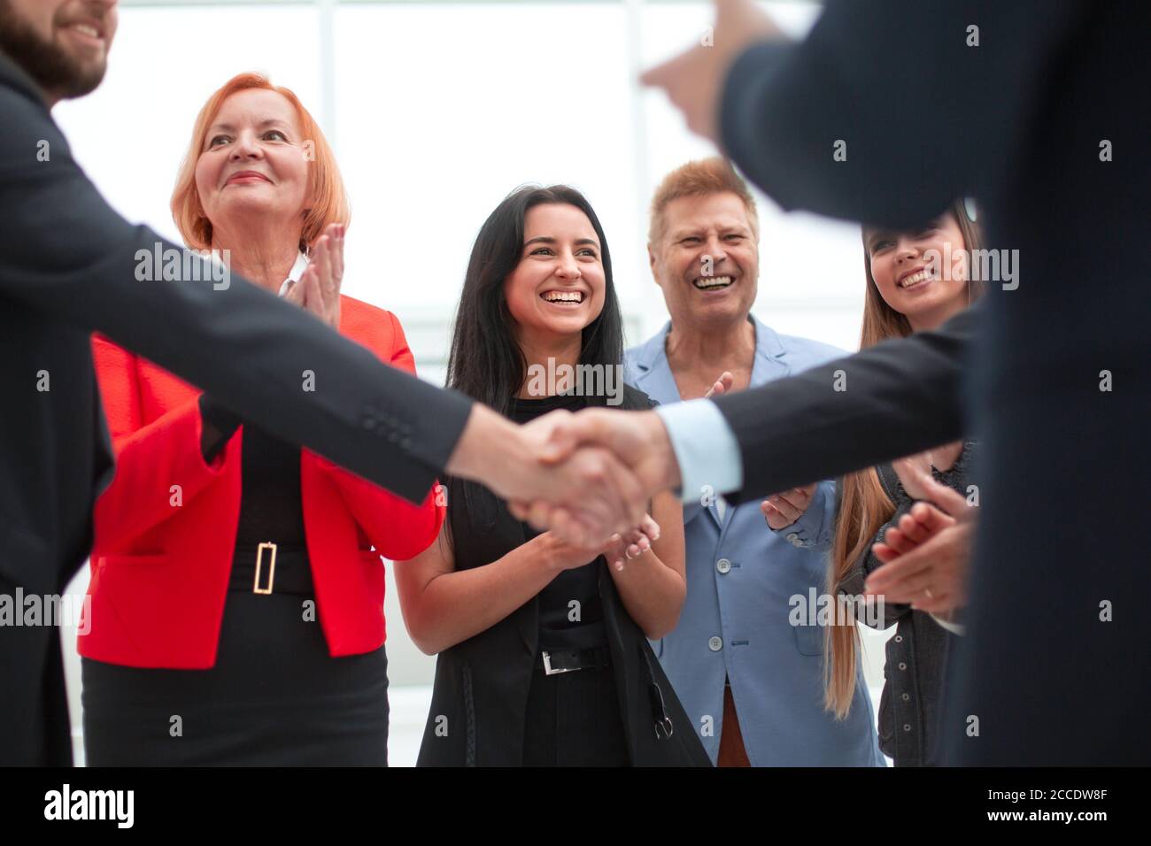 Business men giving a handshake. Business concept Stock Photo - Alamy