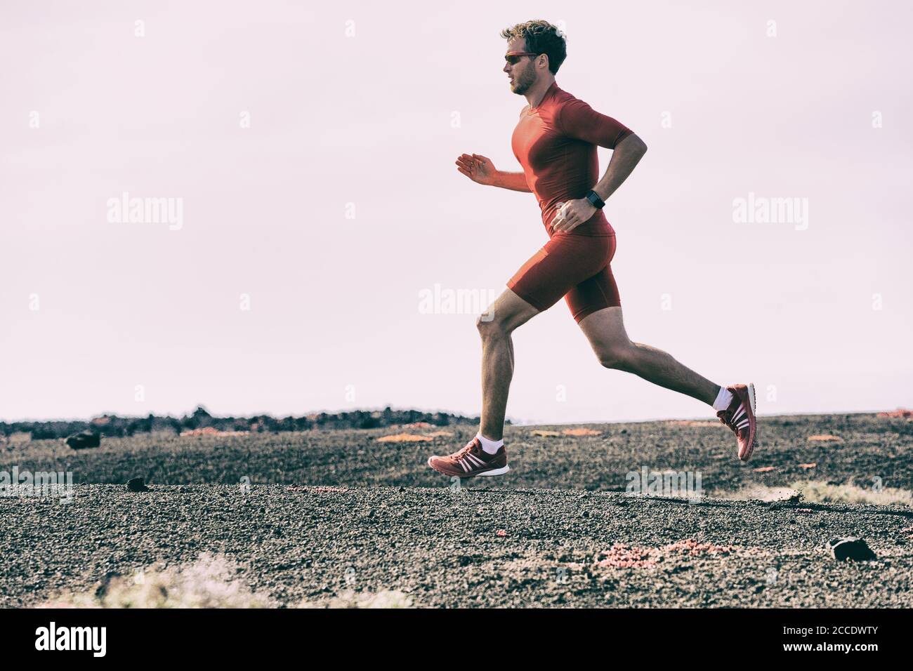 Men running race body suit hi-res stock photography and images - Alamy